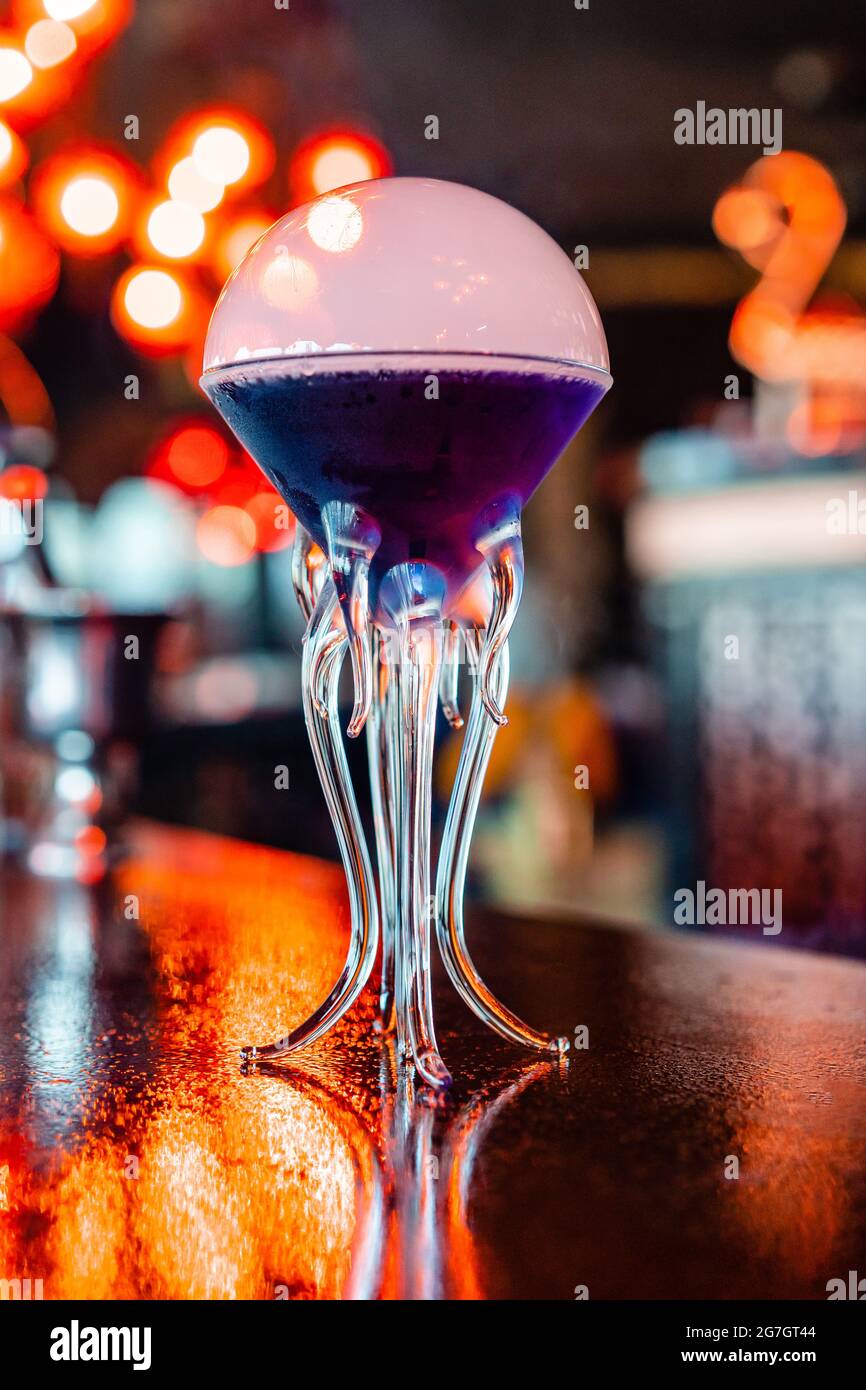 Low angle of refreshing flavor blaster cocktail in glass served on ...