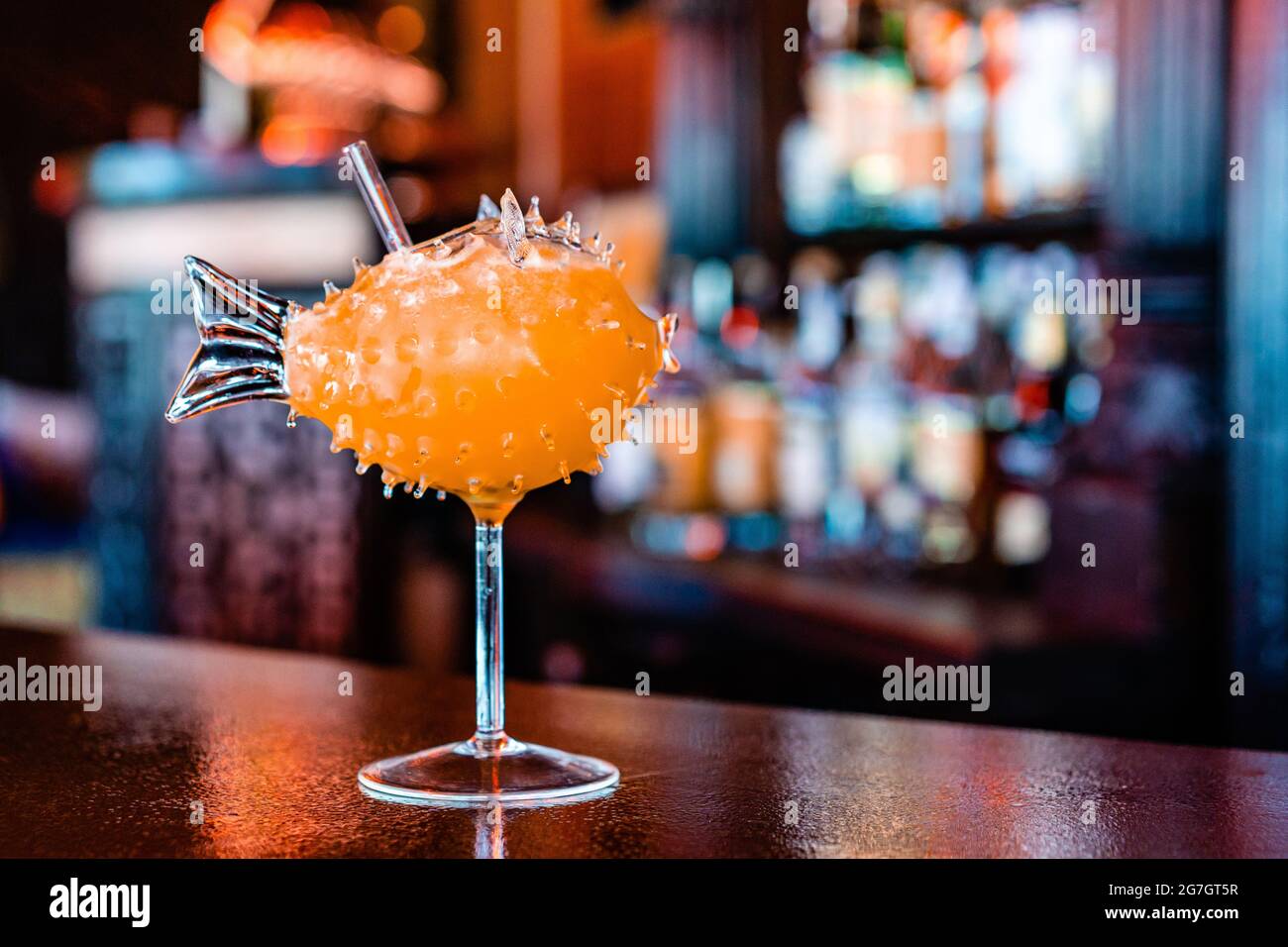 Side view of refreshing flavor blaster cocktail in glass served on ...