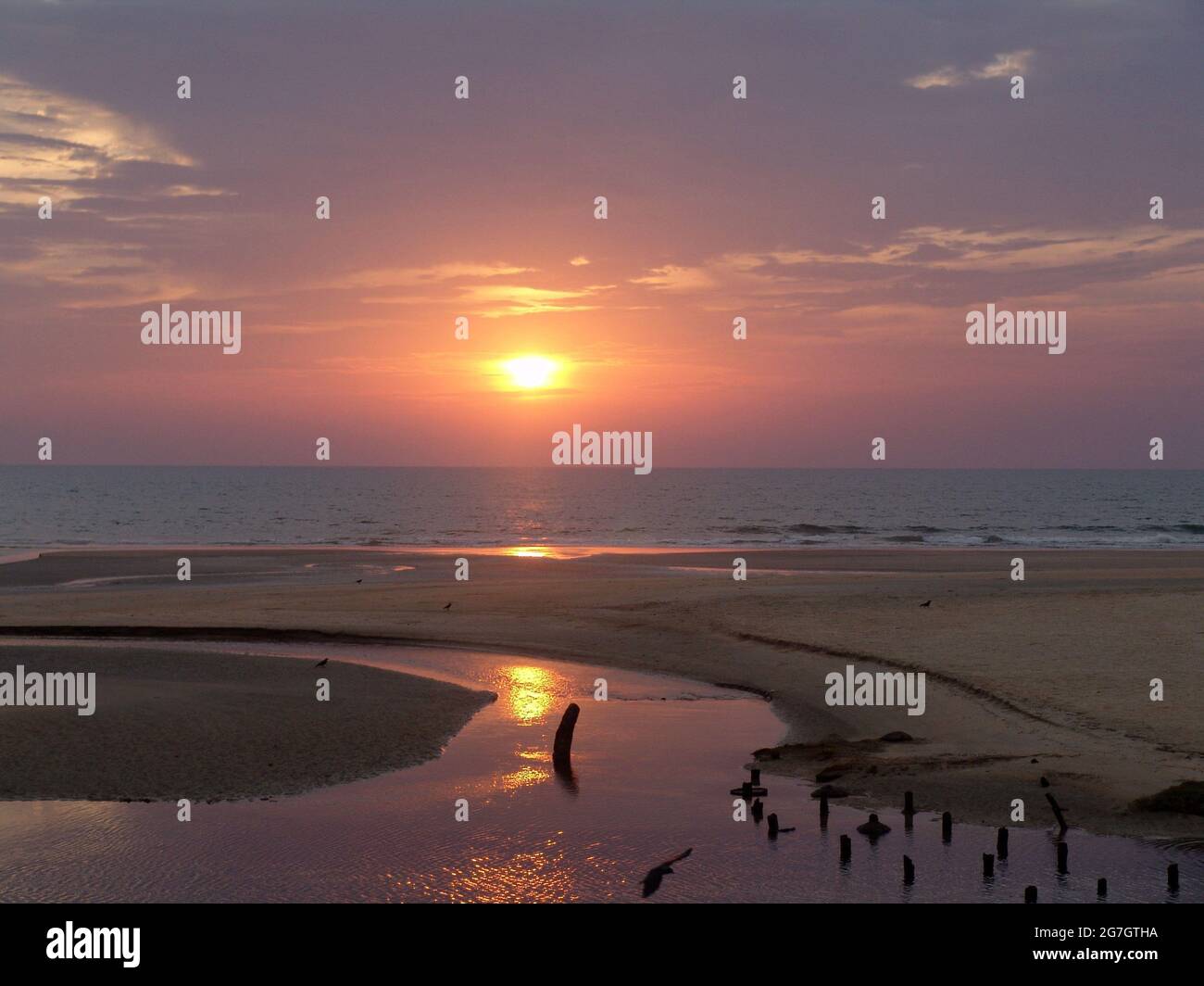 Sunset on the beach of Goa, India, Goa Stock Photo - Alamy