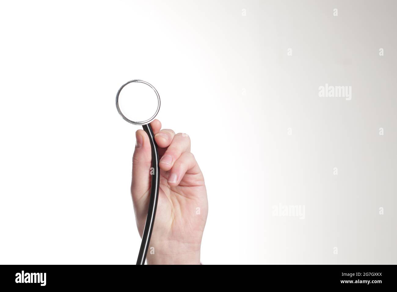 Woman doctor put on stethoscope hi-res stock photography and images - Alamy