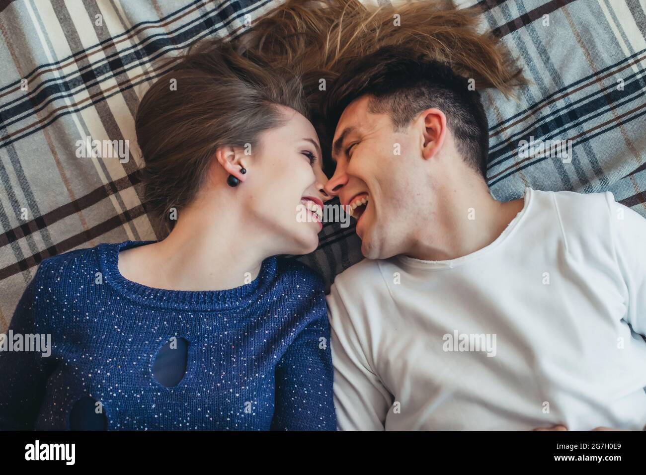 Beautiful happy couple smiling Stock Photo - Alamy