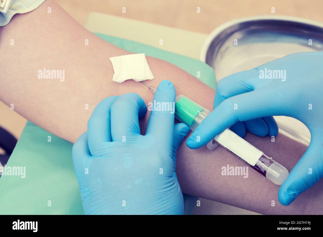 Nurse taking blood sample to make a test in laboratory Stock Photo - Alamy