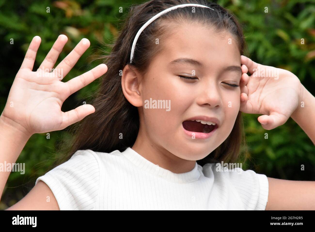 A Fearful Youthful Philippina Person Outside Stock Photo - Alamy