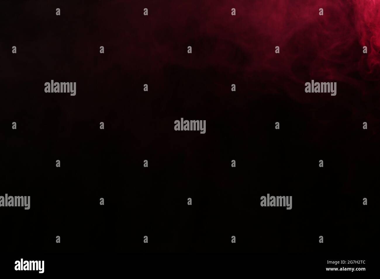 Smoke in red light on black background Stock Photo - Alamy