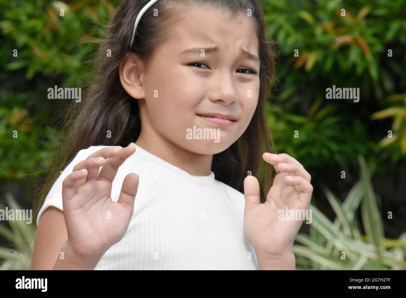 Pretty Philippina Girl And Fear Outside Stock Photo - Alamy
