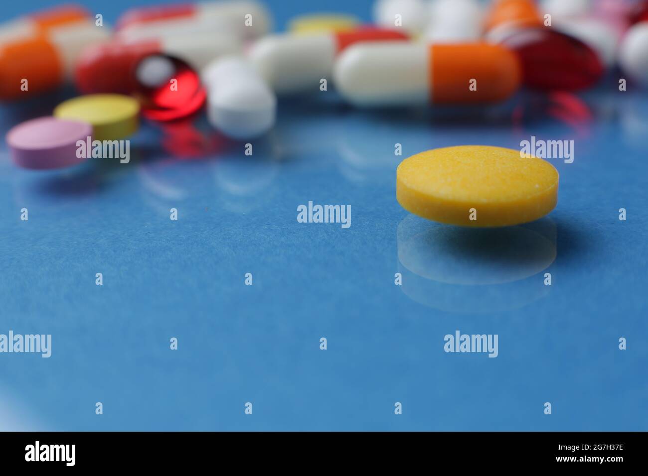 Colorful of tablets and capsules pill in blister packaging arranged ...