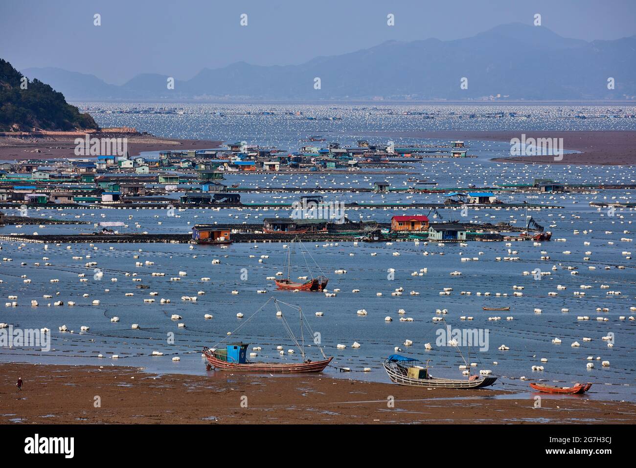 Floating city in lagoon Stock Photo - Alamy