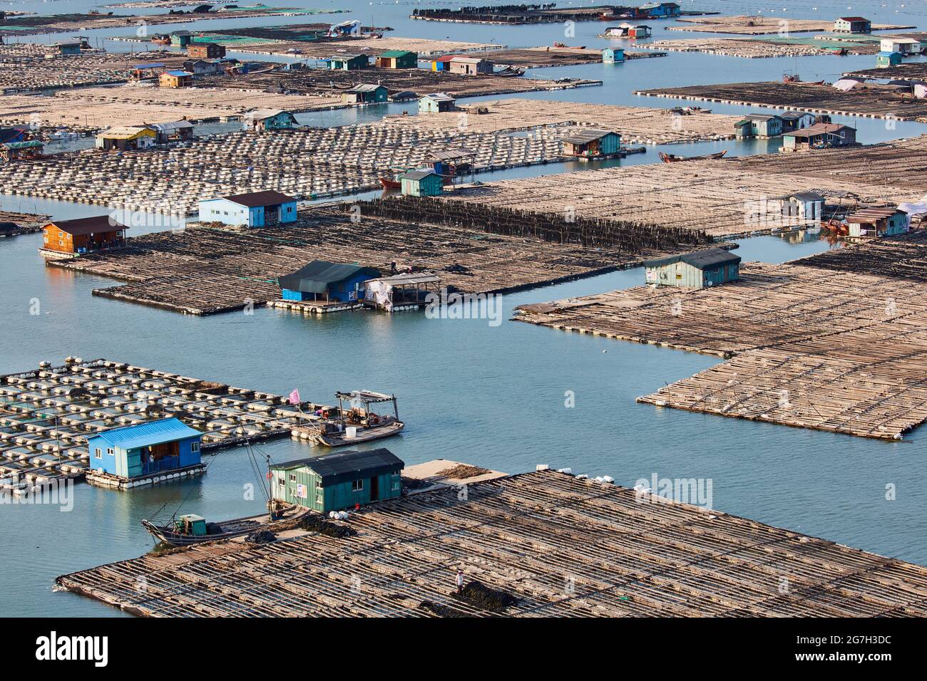 Floating city in lagoon Stock Photo - Alamy
