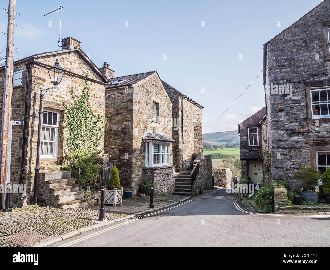 The image is typical street scene in the South Cumbrian town of Kirkby ...