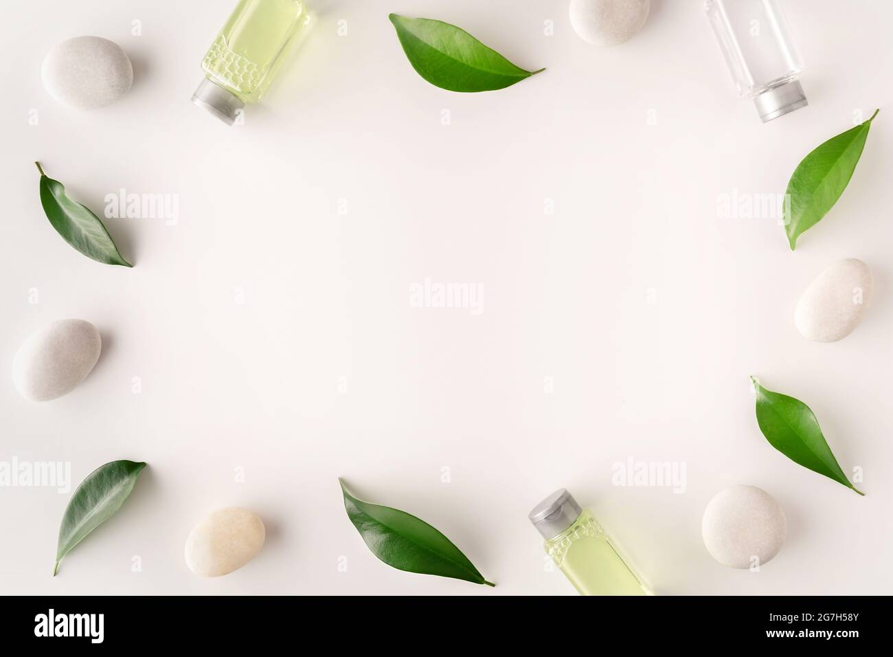 Beautiful spa composition of natural cosmetics with sea pebbles and ...