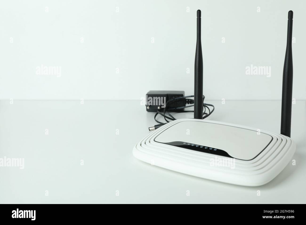Wi-Fi router with external antennas and plug on white background Stock ...