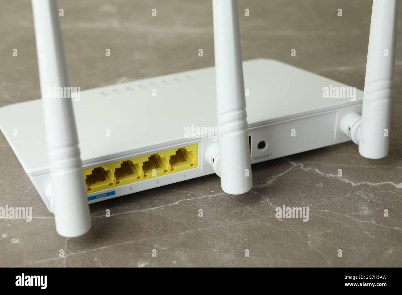 Wi-Fi router with external antennas on gray textured table Stock Photo ...