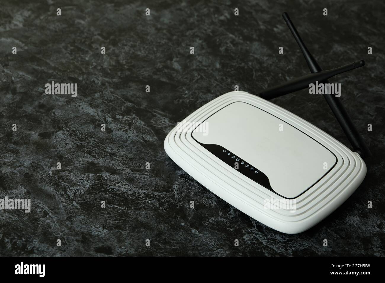 Wi-Fi router with external antennas on black smokey background Stock ...