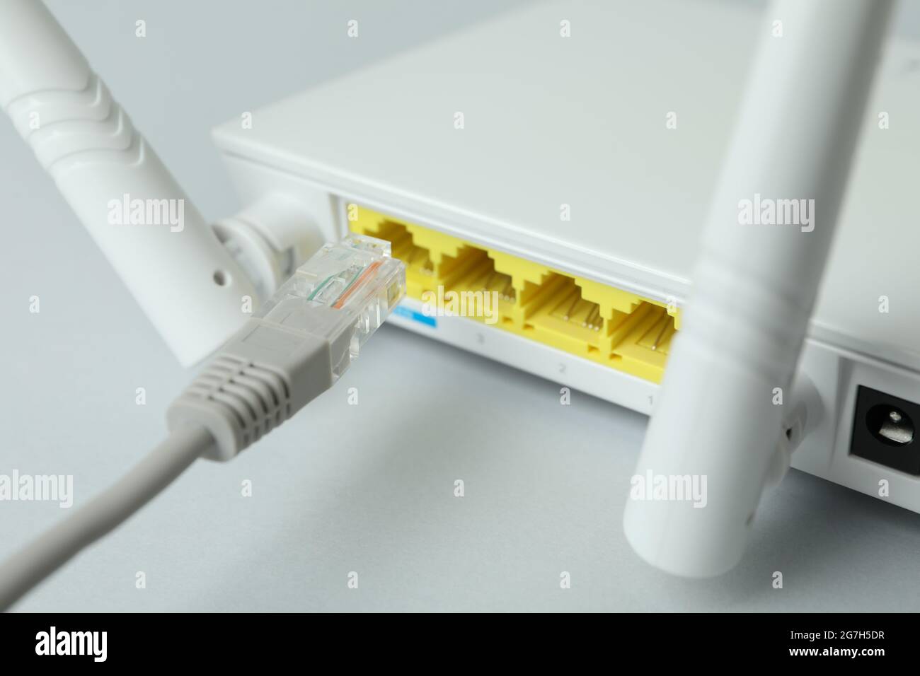 Wi - fi router and connection cable, close up Stock Photo - Alamy