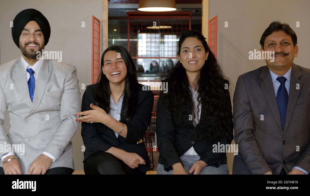 South Asian partners from India posing for a photo Stock Photo - Alamy
