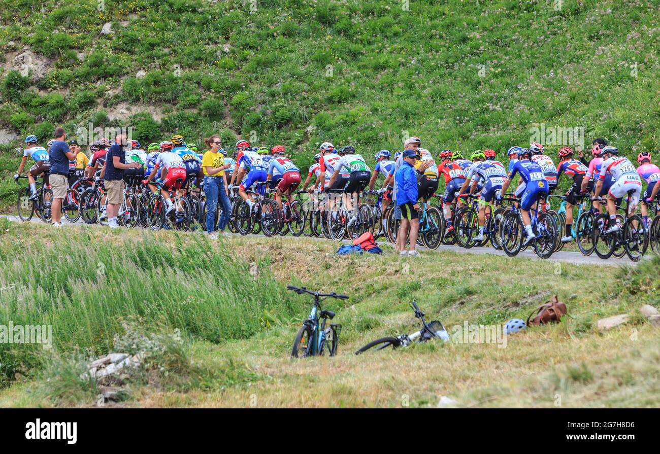 Col de Iseran, France - July 26, 2019: The Peloton climbing the road to ...