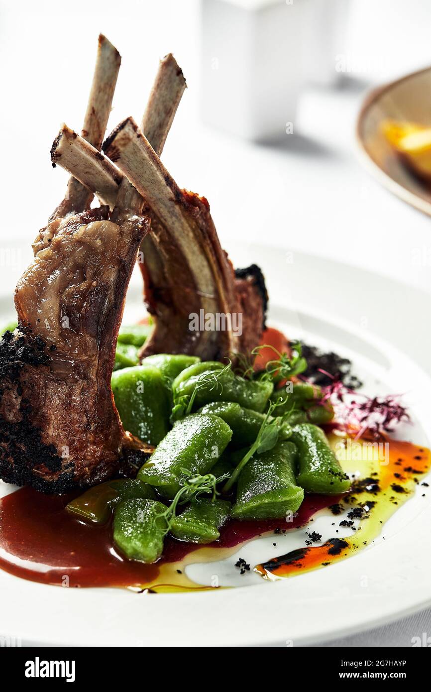 Classic lamb chops plate served french style, Grilled rack of lamb on a ...
