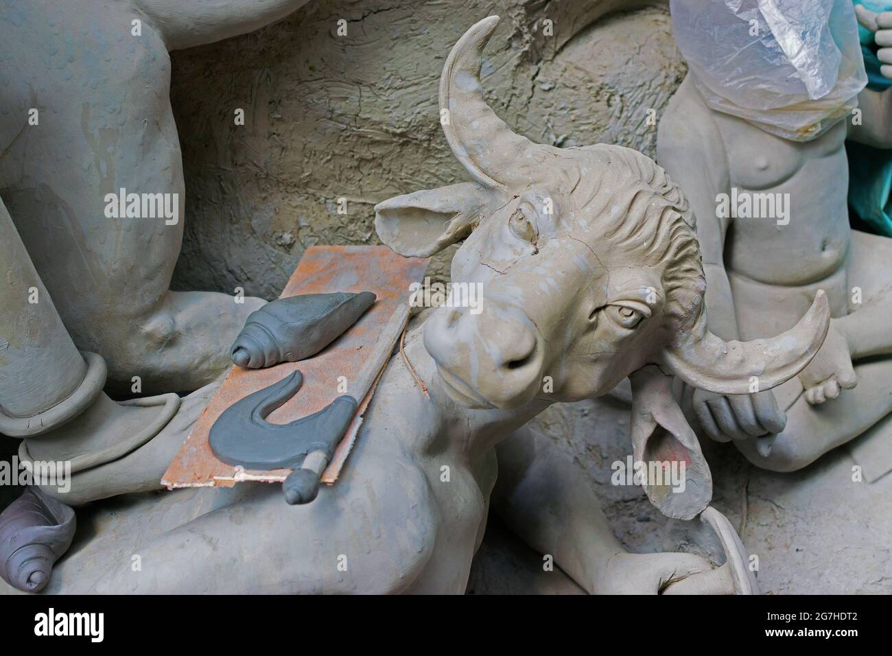 Clay idol of Asura, the demon, killed by Goddess Durga, for "Durga Puja ...