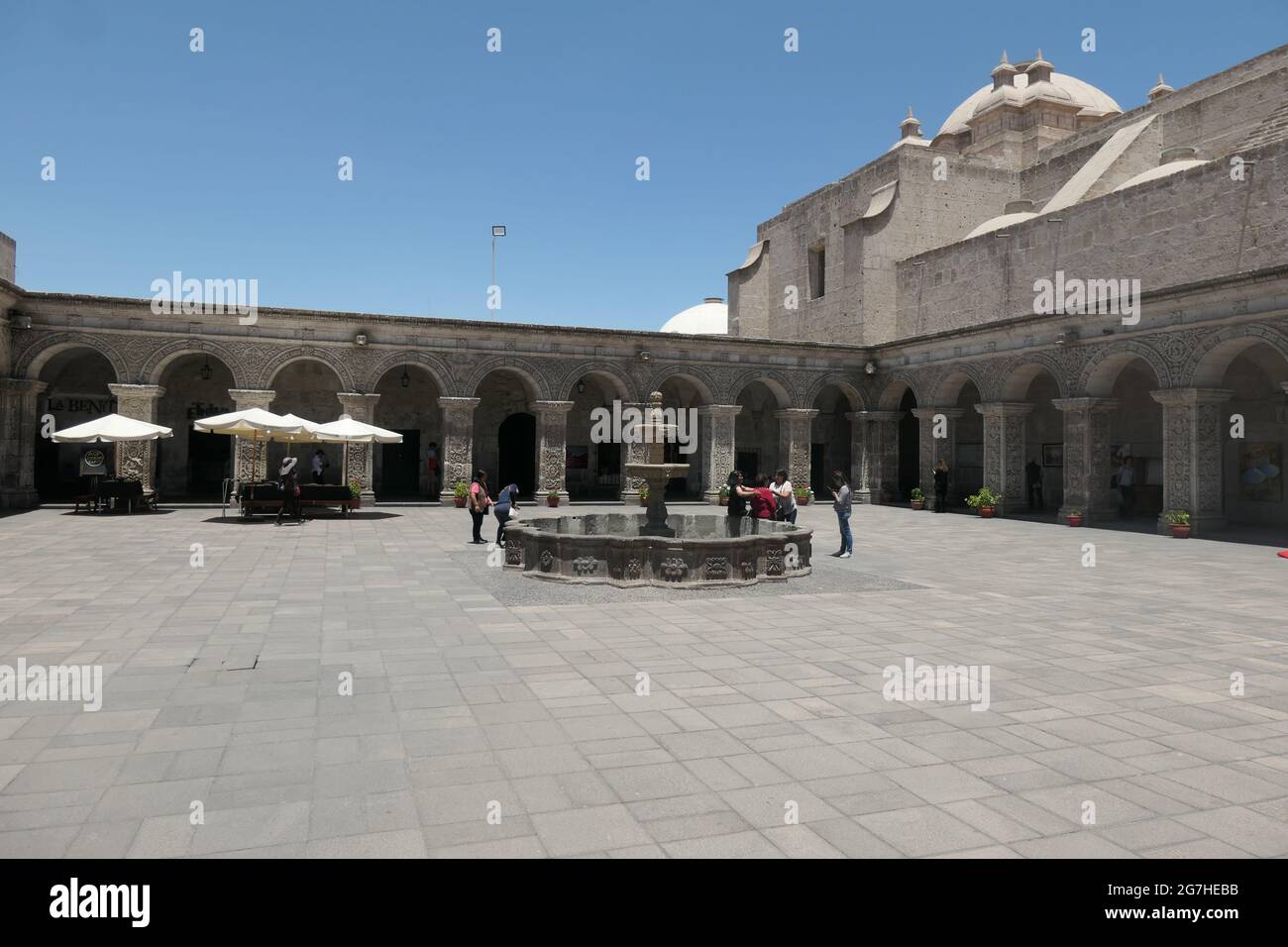 Square in Arequipa Peru fountain arch arches people tourist tourists ...