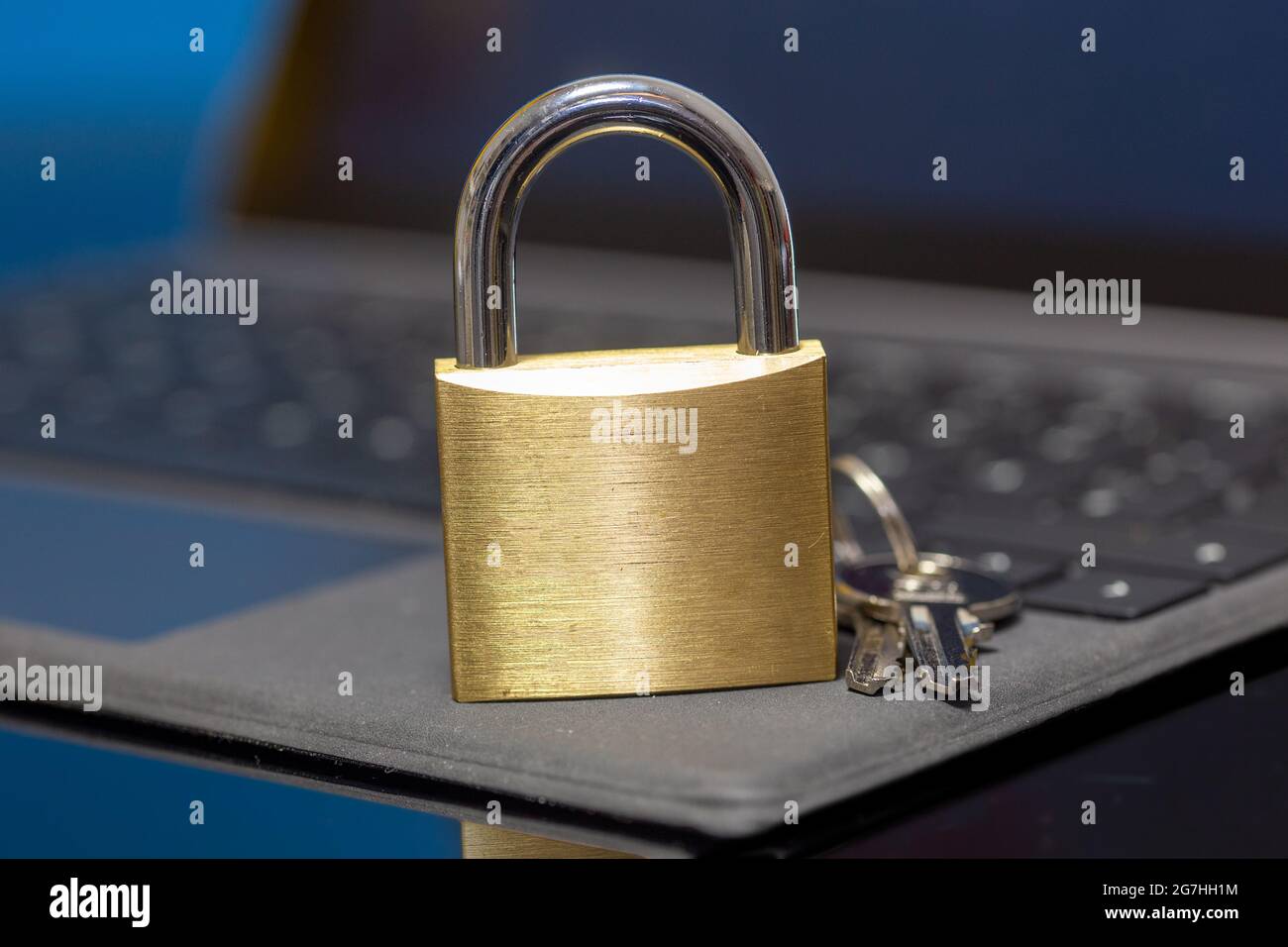 Padlock on a keyboard as a symbolic image for internet security, hacker ...