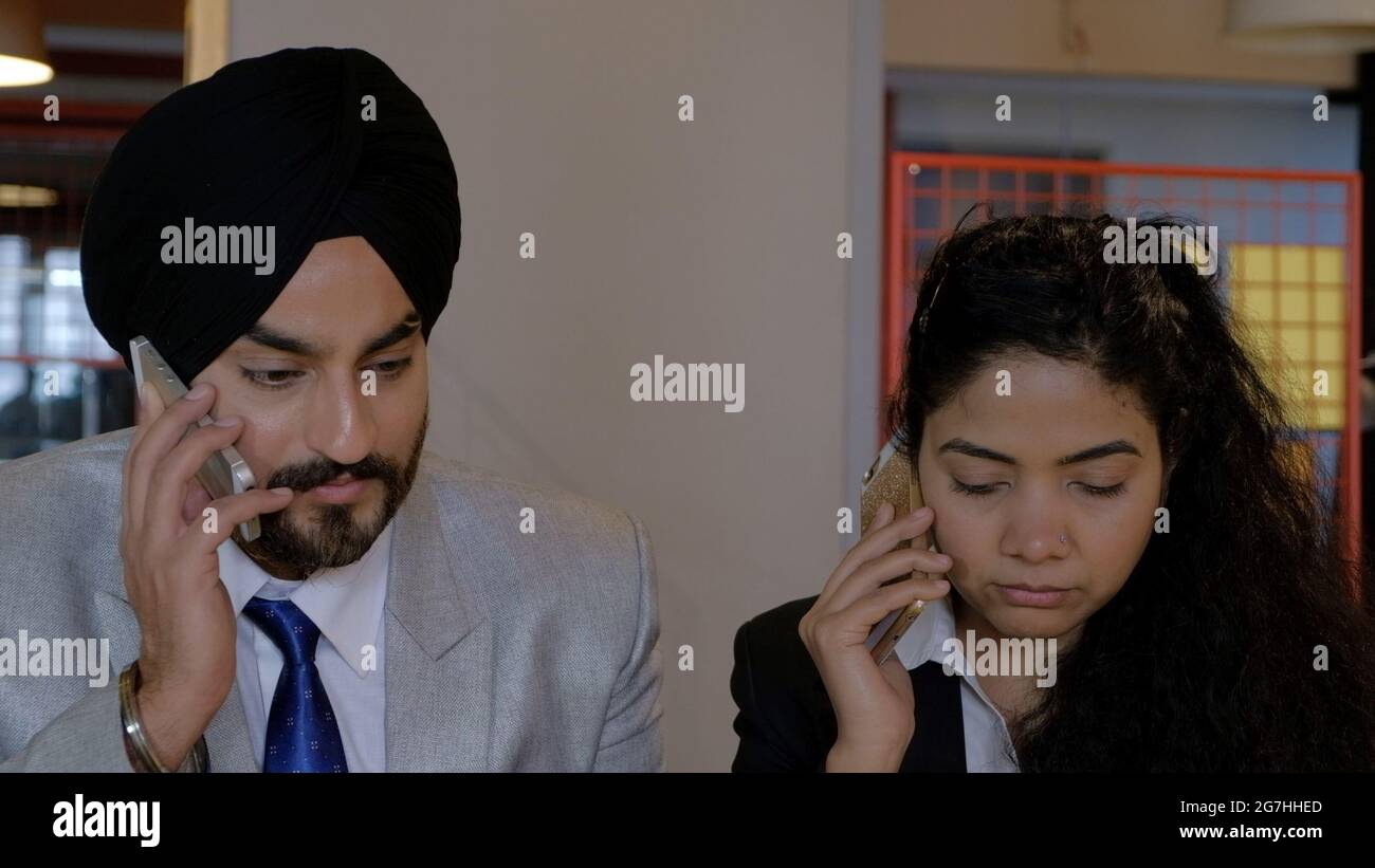 Indian workers phone hi-res stock photography and images - Alamy