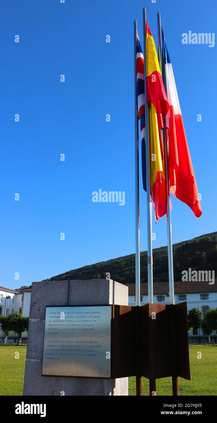 Three flags of Spain France and Great Britain on a bicentenary monument ...