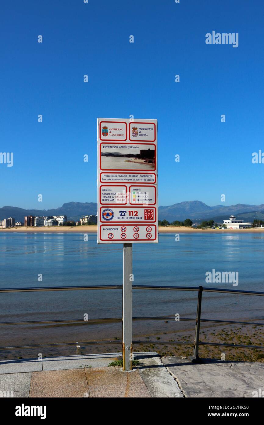 Beach sign with rules in Spanish Santona Cantabria Spain on a sunny ...