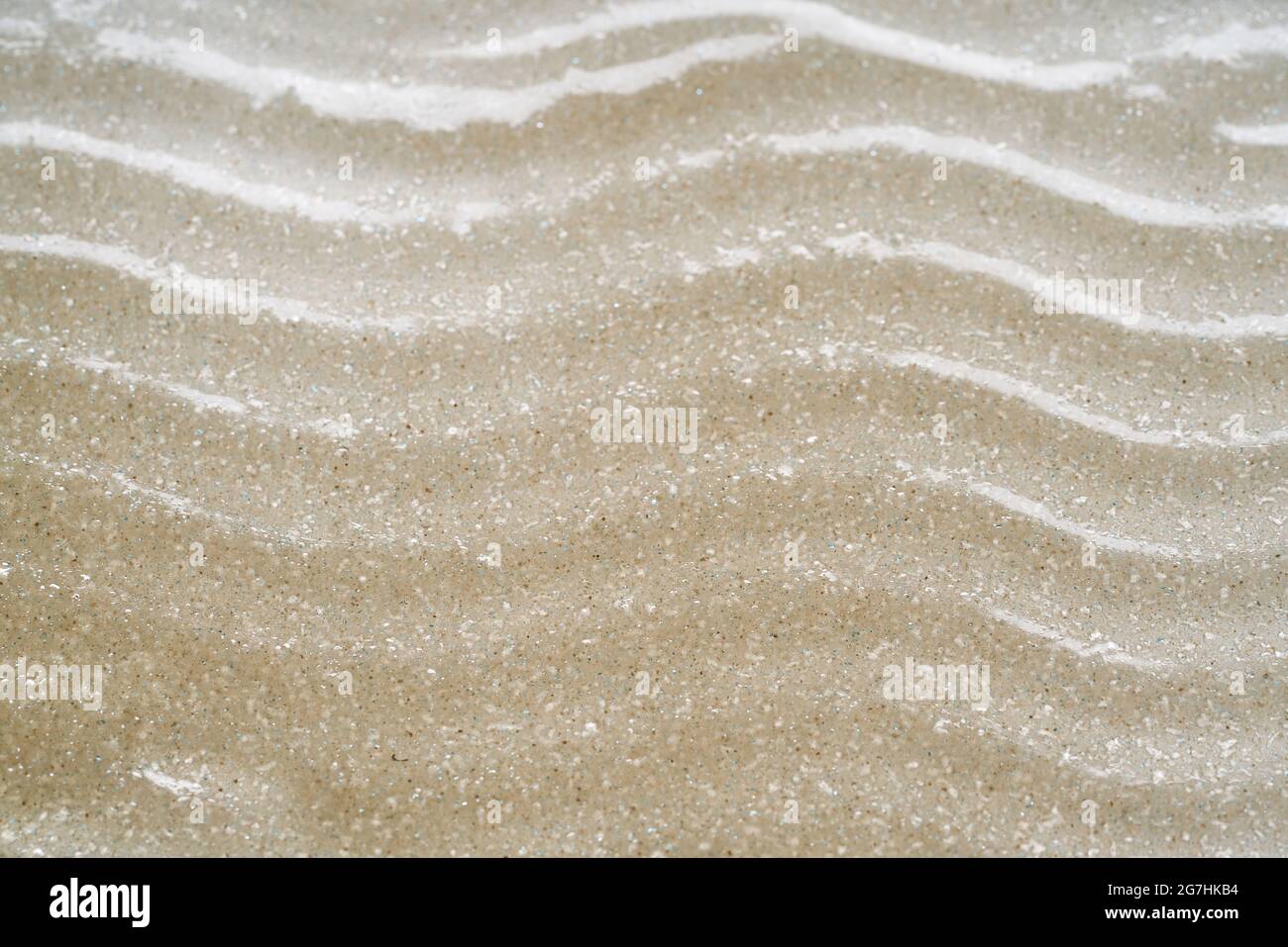 Light gray texture of cosmetic product, body scrub isolated on white ...