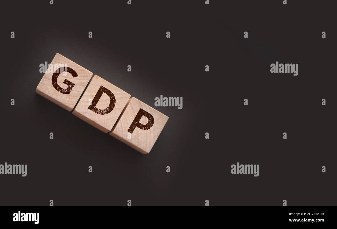 GDP, Gross Domestic Product concept, cube wooden block with alphabet ...