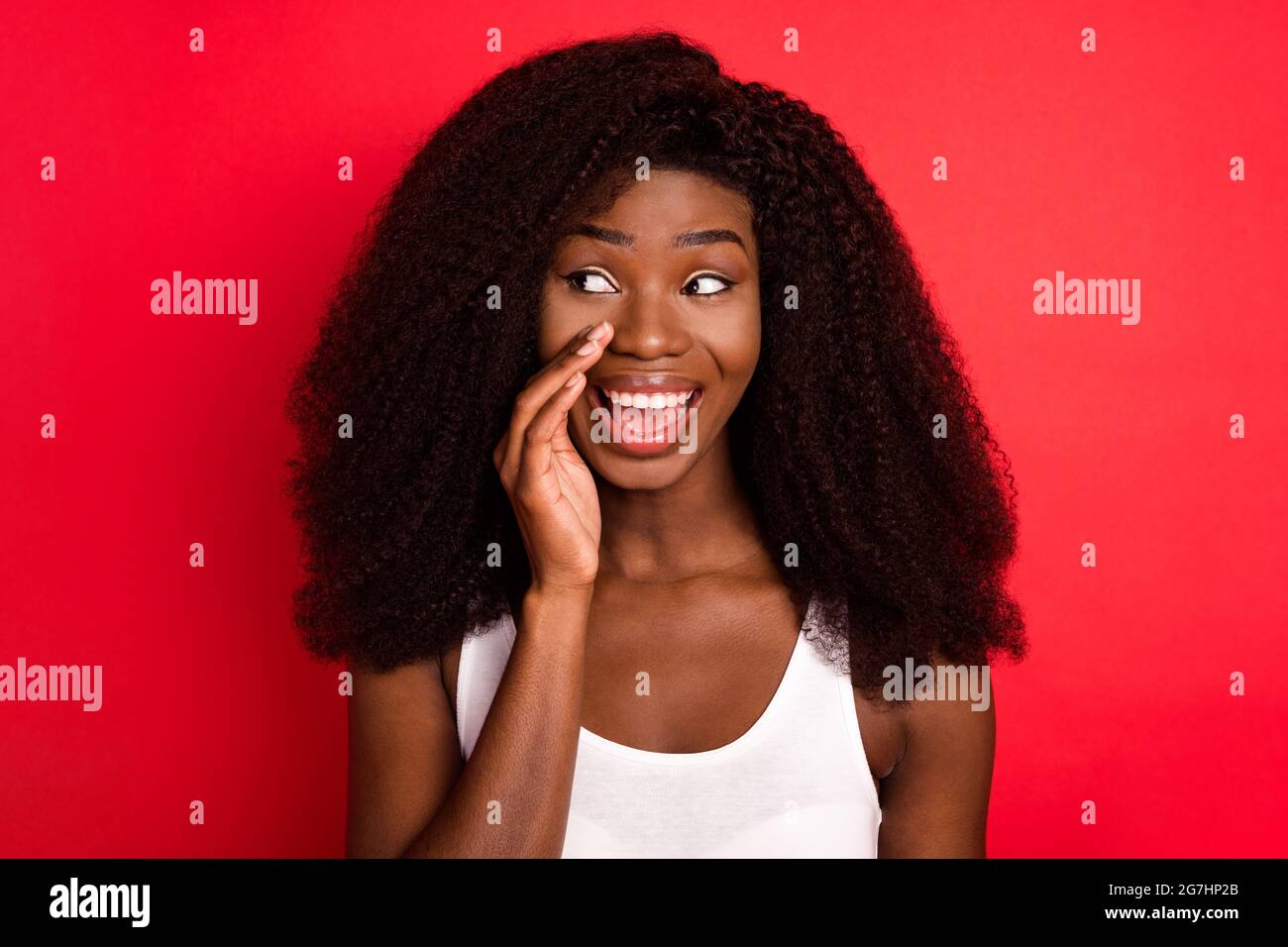 Hand over mouth african hi-res stock photography and images - Alamy