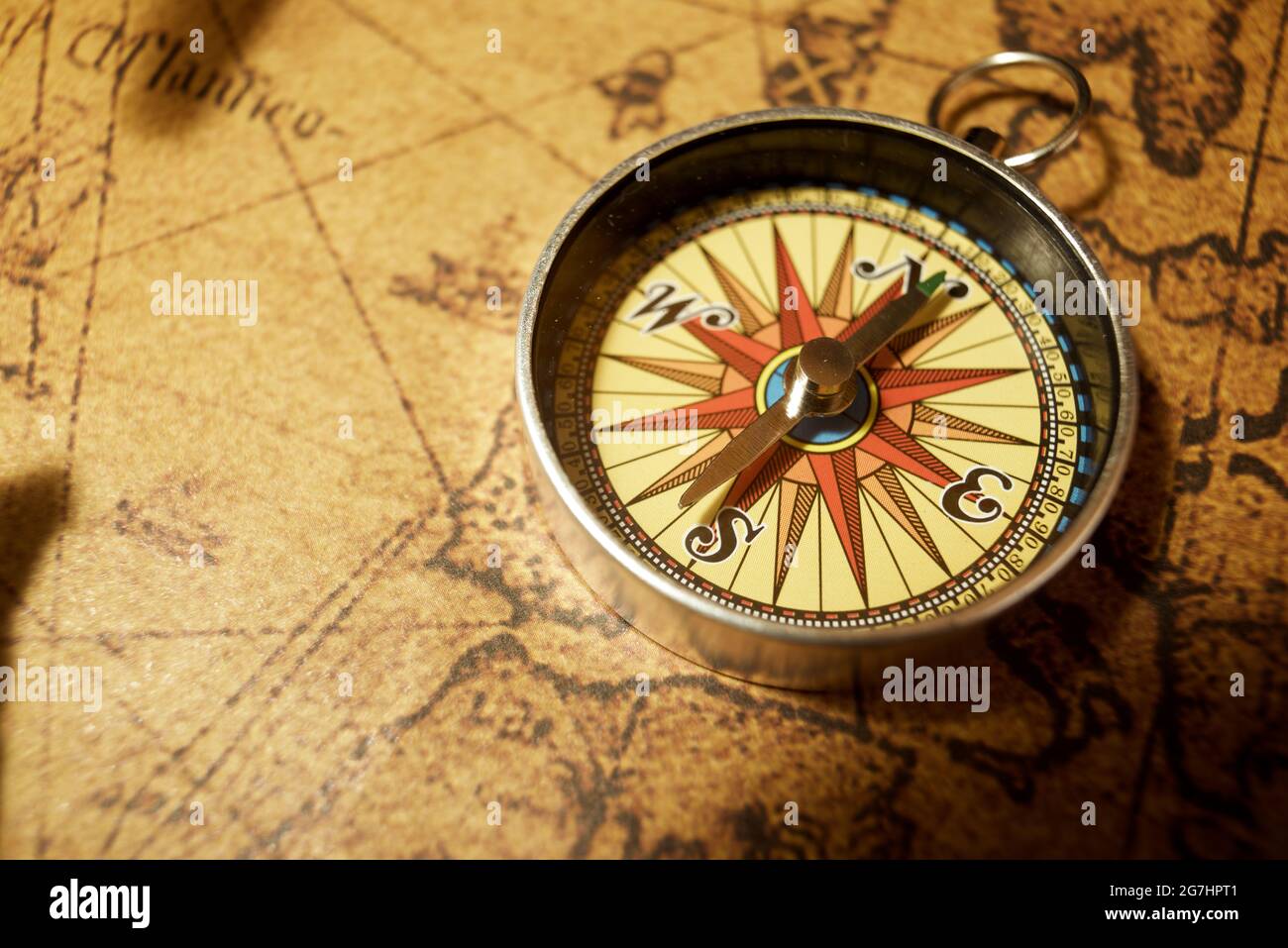 Vintage compass and old navigation map Stock Photo - Alamy