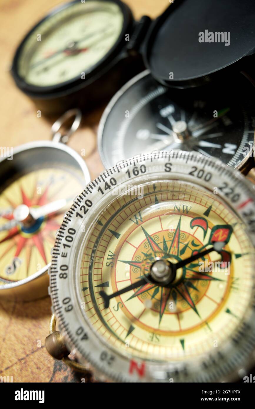 Vintage compass and old navigation map Stock Photo - Alamy