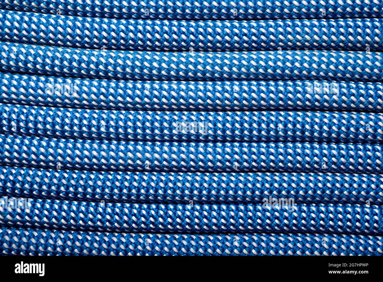 Blue climbing rope close up Stock Photo - Alamy