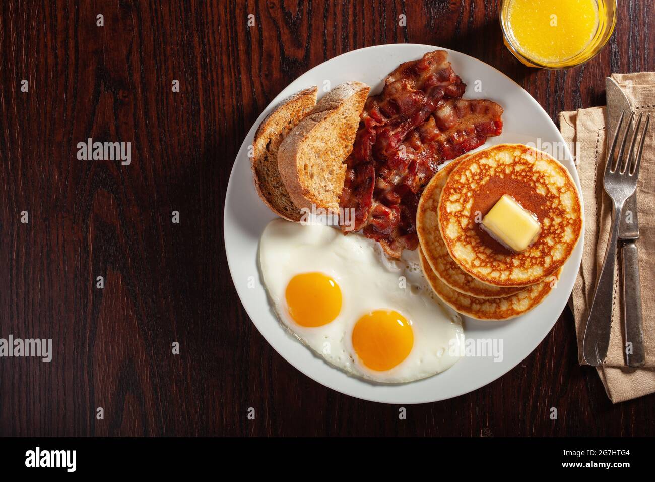 traditional full american breakfast eggs pancakes with bacon and toast ...