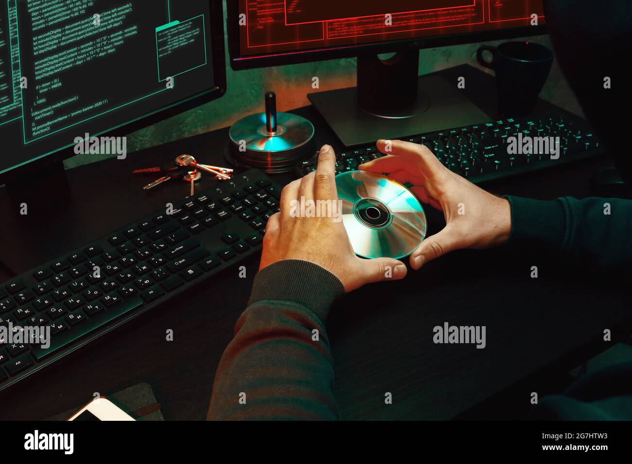Close up of programmer of hacker hands typing a code Stock Photo - Alamy