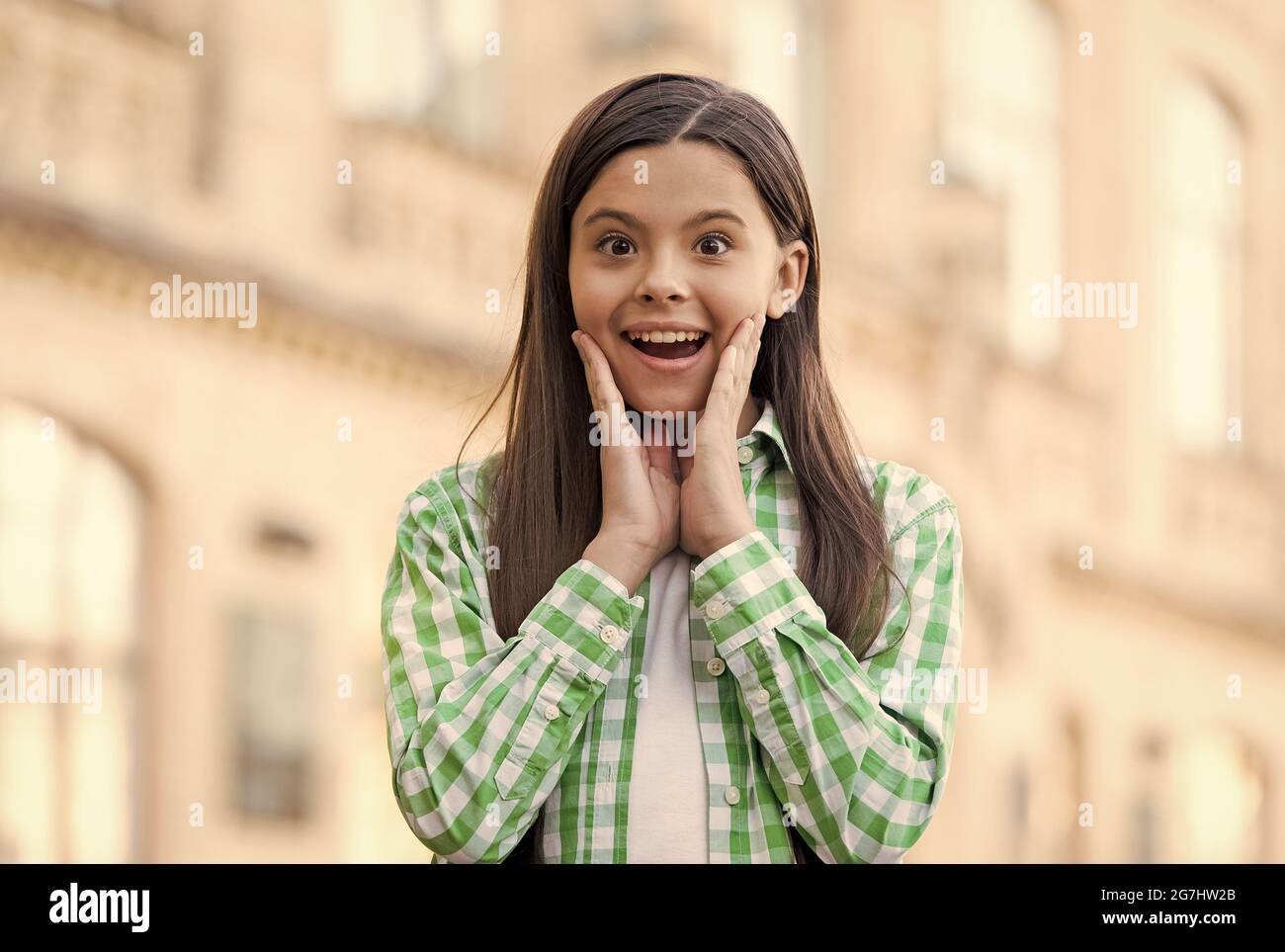 Visit your dentist regularly. Happy kid smile urban outdoors. Dental ...