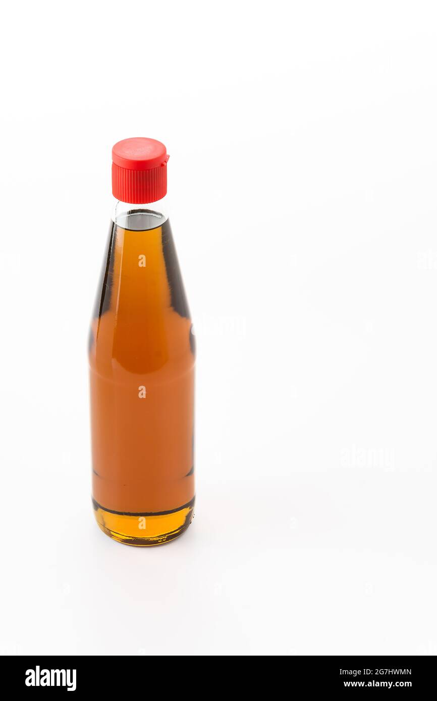 bottle of sesame oil on white background Stock Photo - Alamy