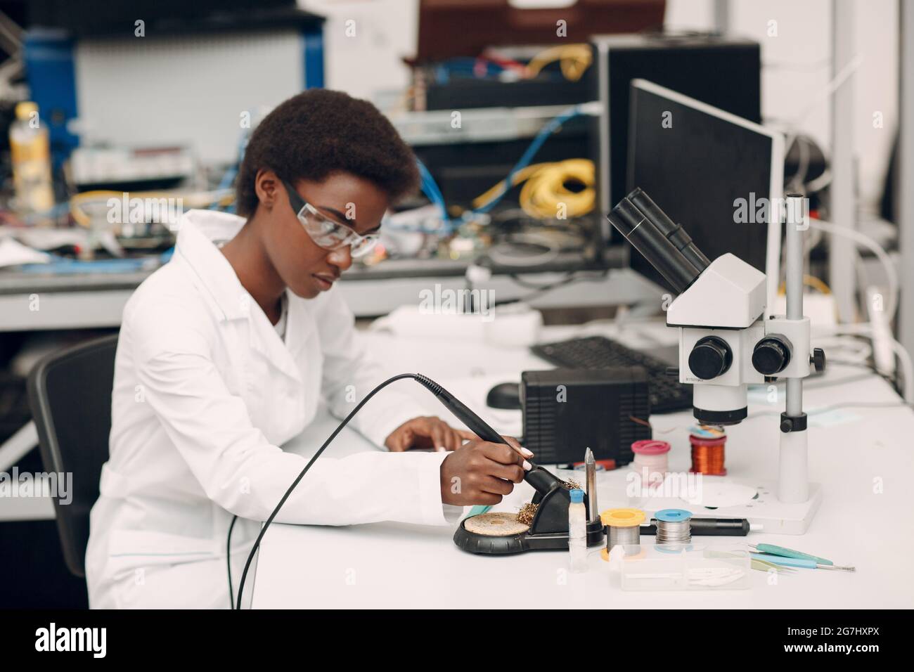 Woman soldering hi-res stock photography and images - Alamy