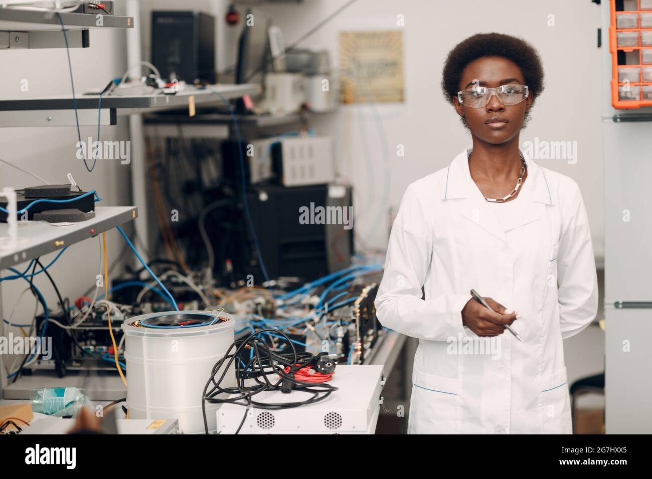Scientist african american woman stand and look at camera in laboratory ...