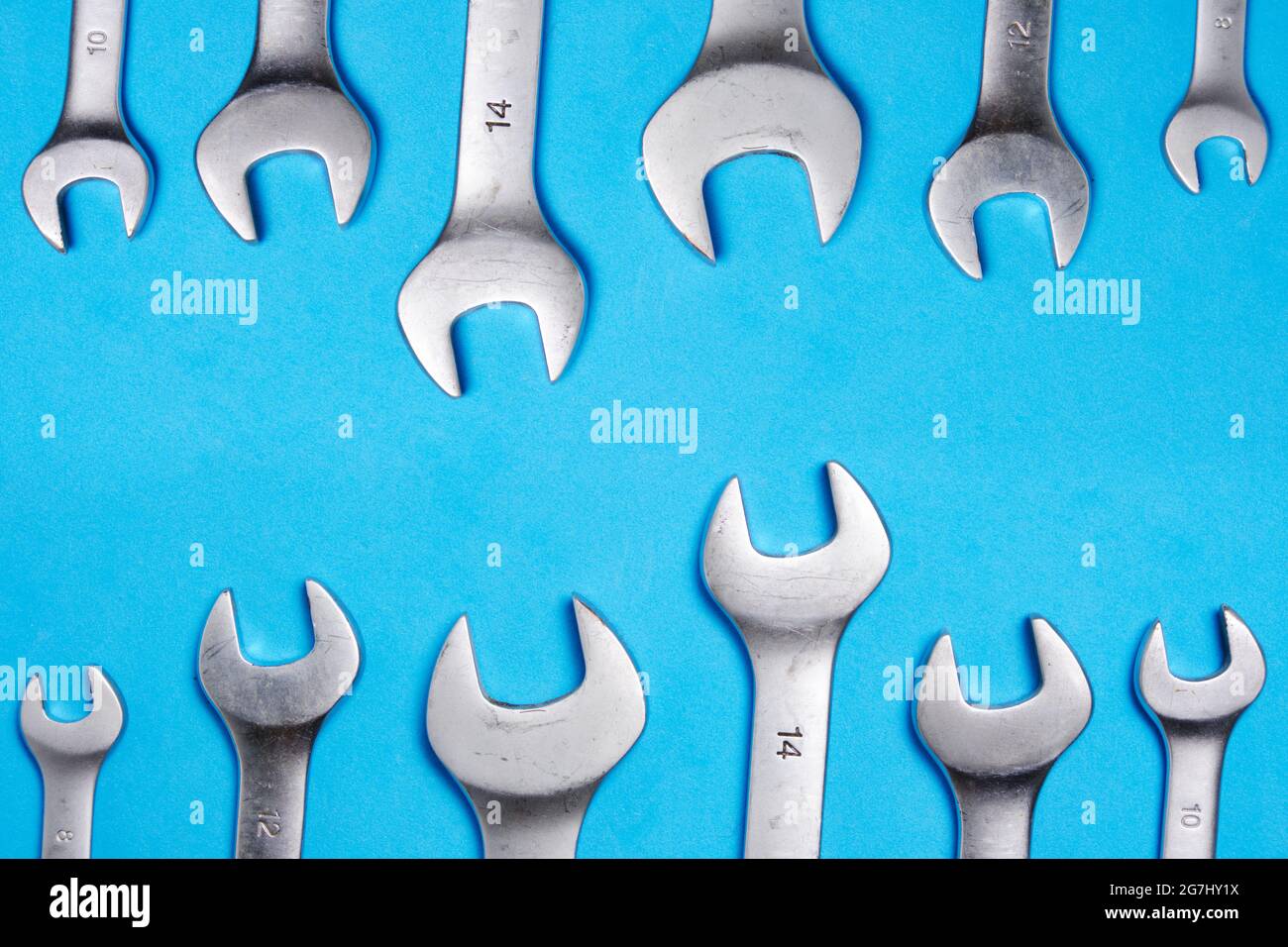 Set of wrenches on a blue background Stock Photo - Alamy