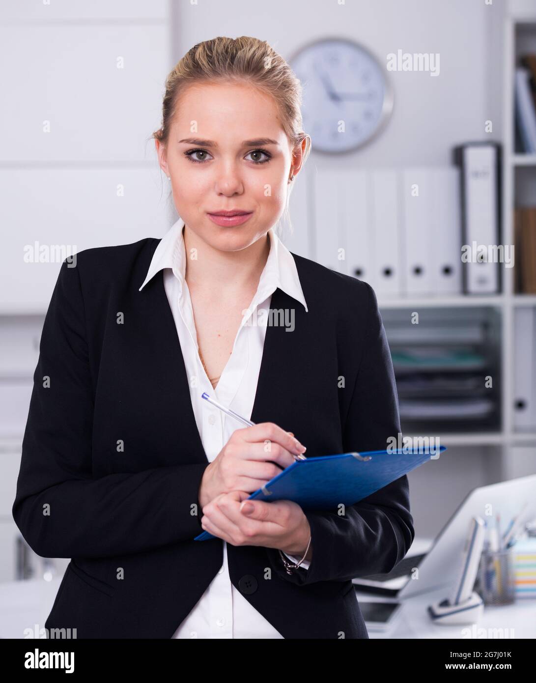 Secretary writing instructions Stock Photo - Alamy