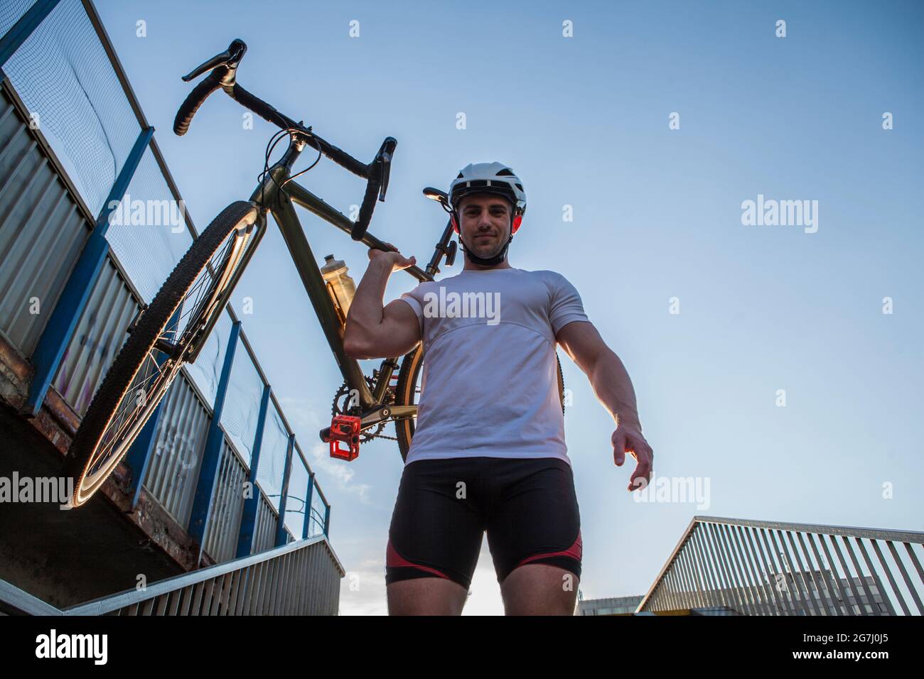 Low angle shot man cycling hi-res stock photography and images - Alamy