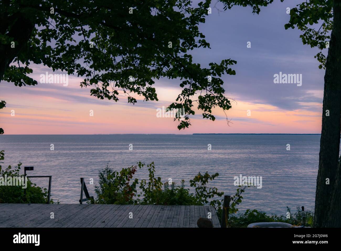 the sky is pink and purple during the early morning sunrise from Snake ...