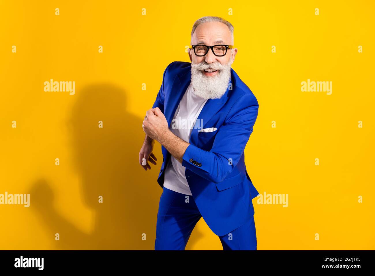 Portrait of attractive funky cheerful man dancing having fun isolated ...