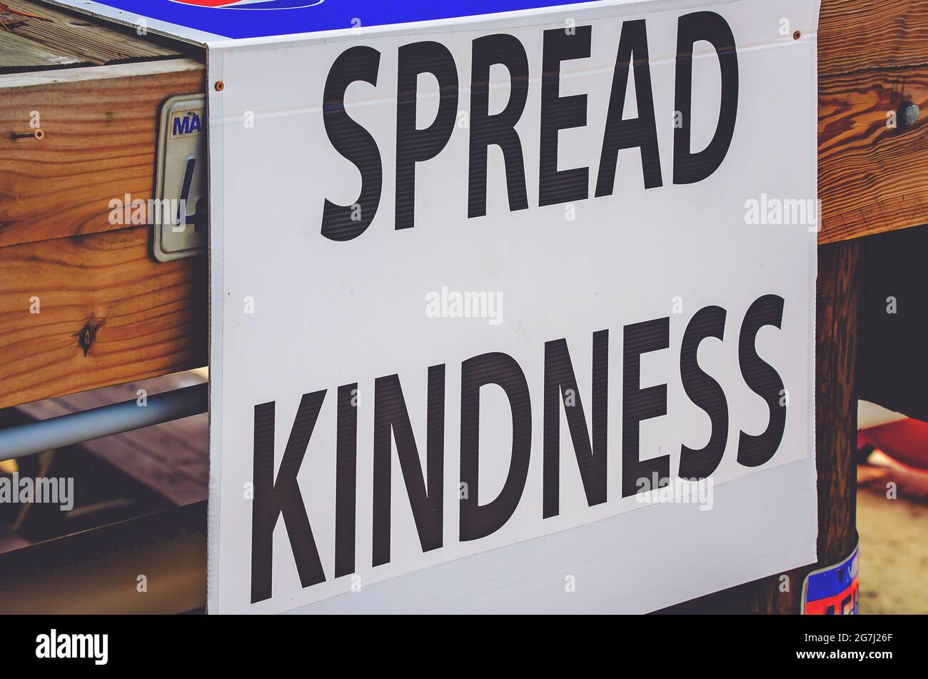 A sign encourages people to spread kindness at The Shed Barbeque and ...