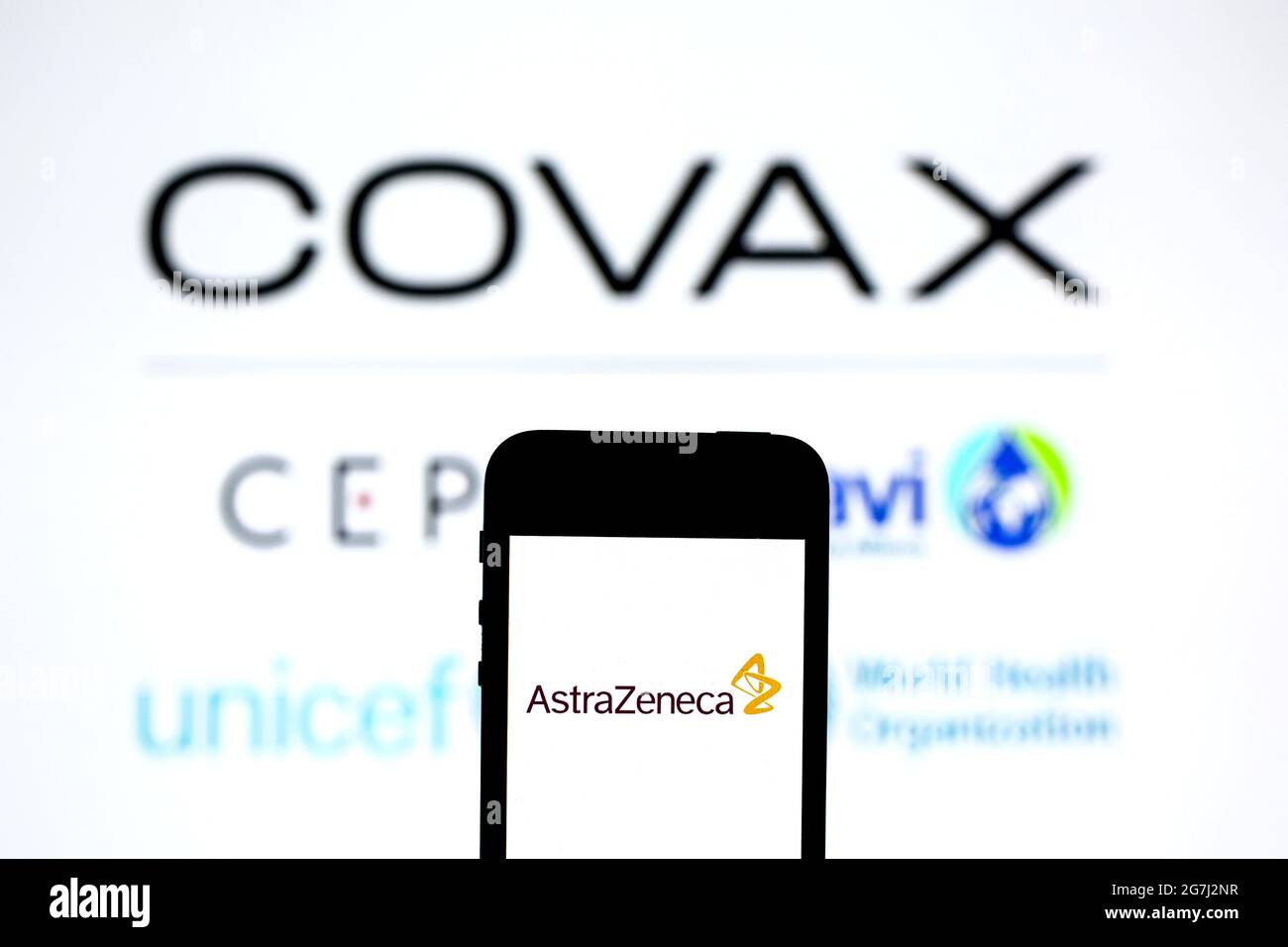 In this photo illustration the AstraZeneca logo seen displayed on a ...