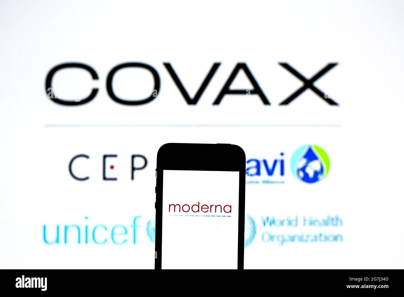 In this photo illustration the Moderna logo seen displayed on a ...