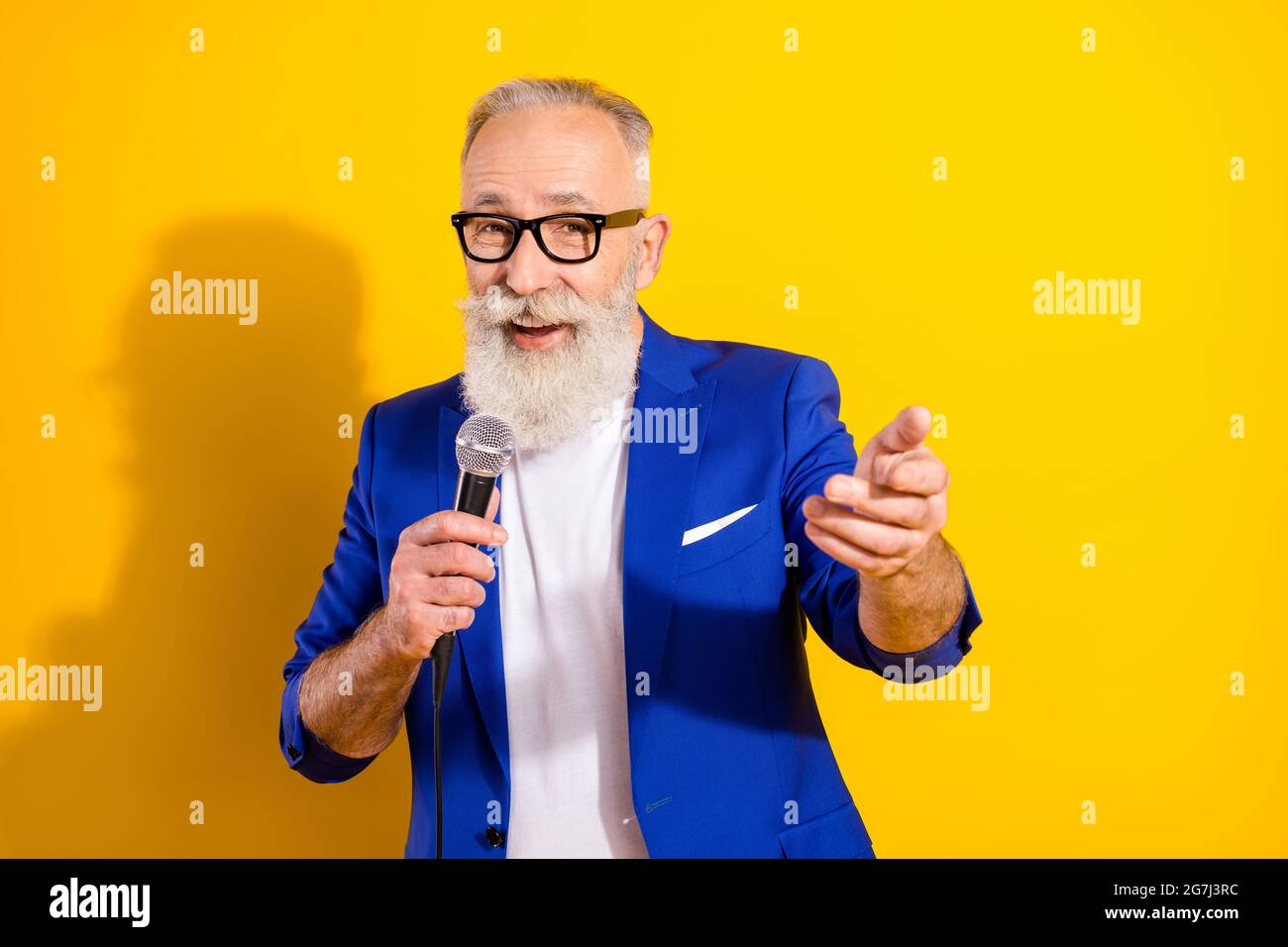 Singer is singing in glasses microphone hi-res stock photography and ...