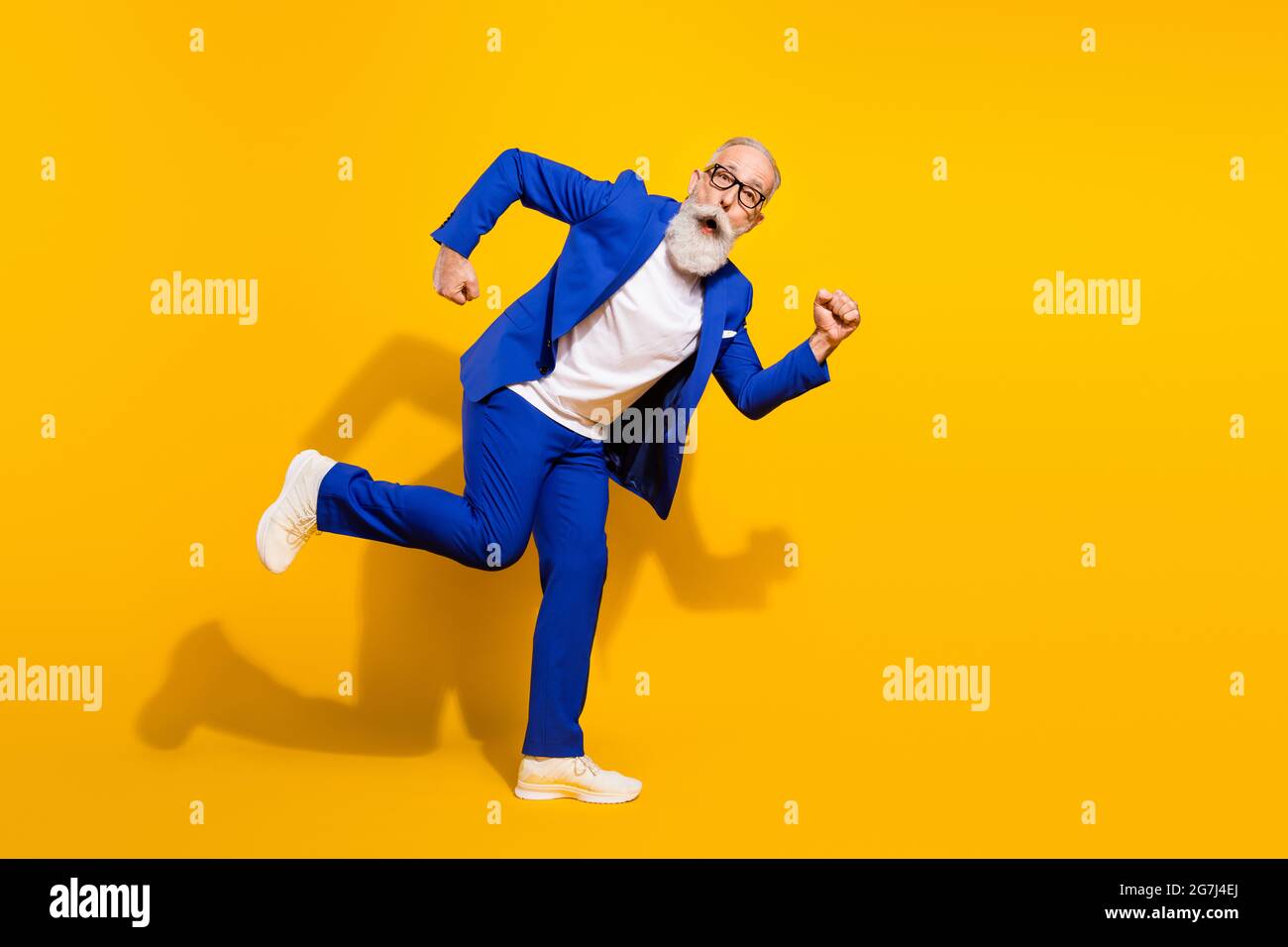 Full length body size view of attractive childish man running fooling ...