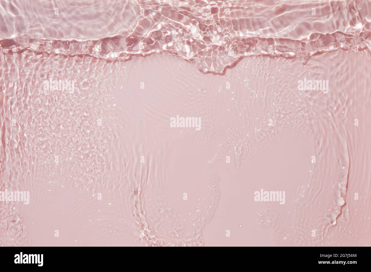 Pink clear water surface texture with splashes and bubbles. Trendy ...